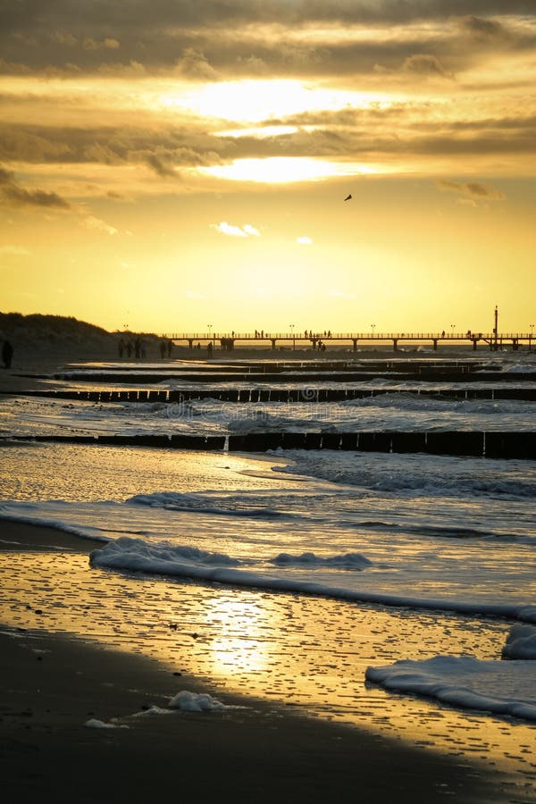 Beautiful Sunset Over a Snowy Sea Stock Photo - Image of ocean, beach ...