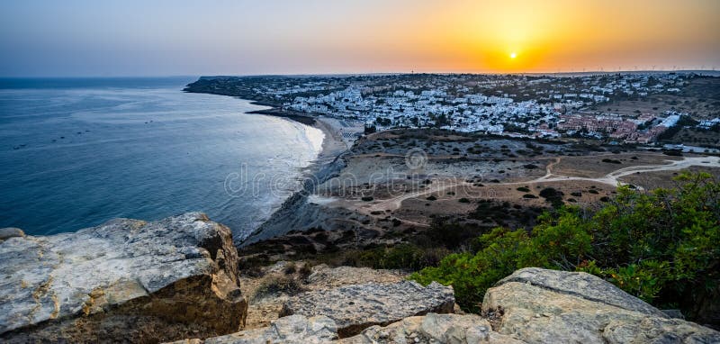 Beautiful Sunset Over the Town and the Beach. Stock Photo - Image of ...