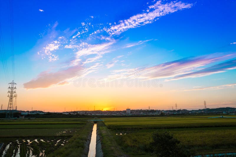Beautiful Sunset Over Village. Stock Photo - Image of field, grass ...