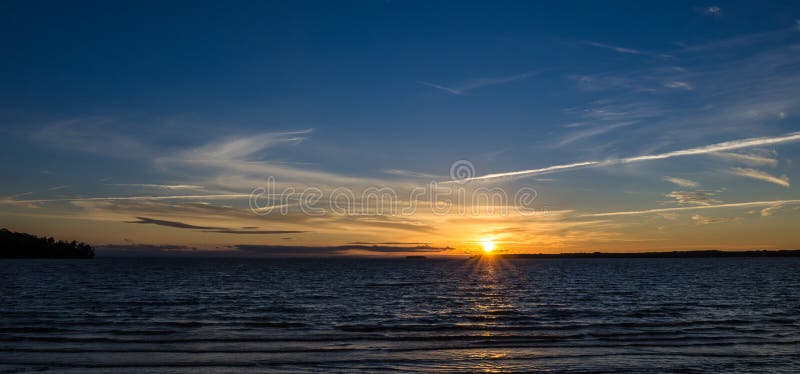Beautiful Sunset Over the Water Stock Photo - Image of blue, landscape ...