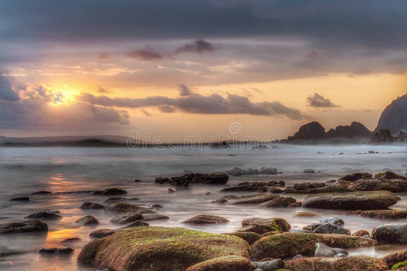 Beautiful sunset at papuma stock photo. Image of sunset - 241152744