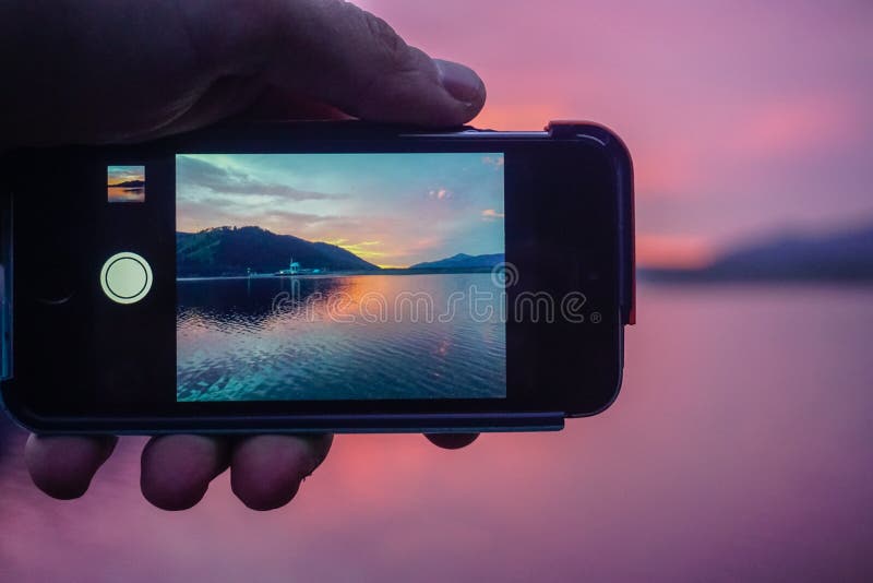 Beautiful Sunset is Photographed on a Mobile Phone Stock Photo - Image ...
