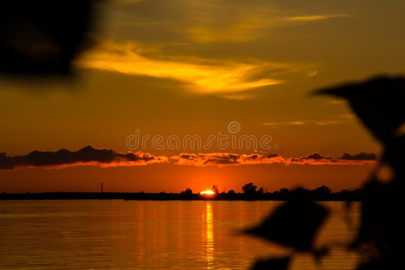 Beautiful Sunset on the Pond. Stock Image - Image of clouds, beach ...