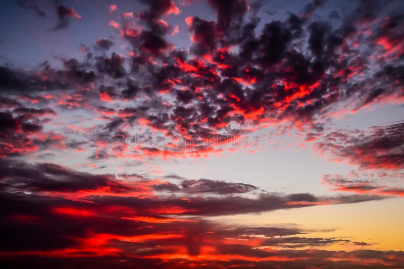 A Beautiful Sunset with a Red Sky and Clouds Stock Photo - Image of ...