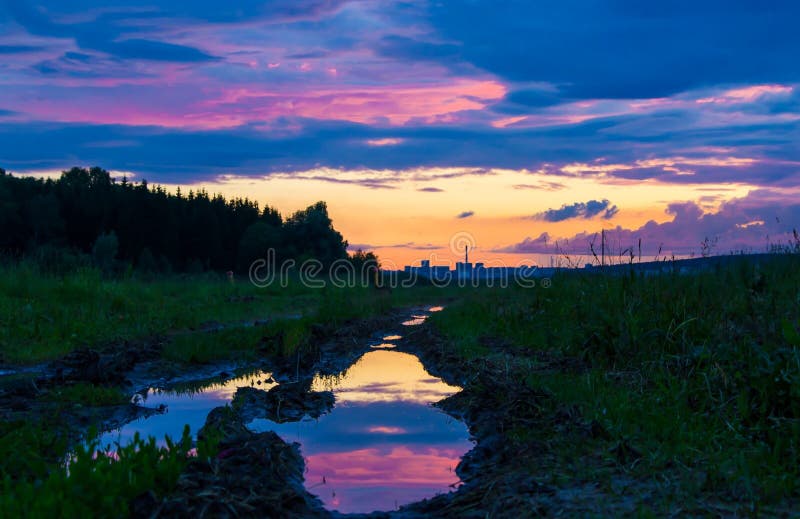 Beautiful Sunset Reflected in a Puddle. Stock Photo - Image of fresh ...