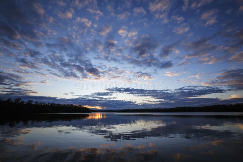 Beautiful Sunset Reflecting Off Lake Stock Photo - Image of cloud, lake ...