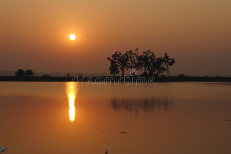 The Beautiful Sunset Reflection of River Capture in Camera Stock Photo ...