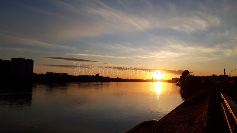 Beautiful Sunset on river stock photo. Image of sunset - 184299156