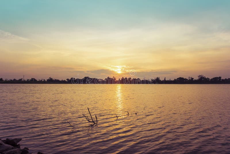 Beautiful sunset on river stock image. Image of orange - 64857675