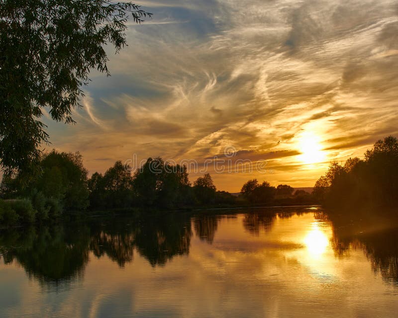 Beautiful Sunset on the River Bank. Sunset River Landscape. River at ...