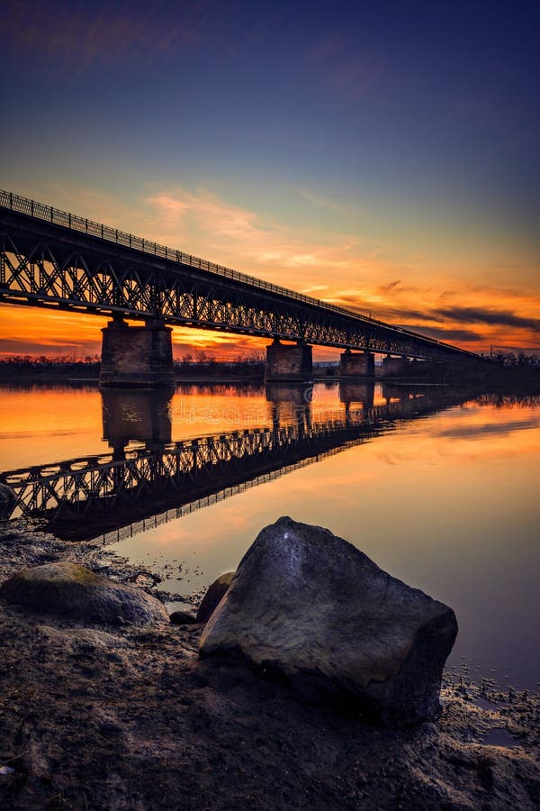 Beautiful Sunset Scene with a Bridge and a River Stock Image - Image of ...