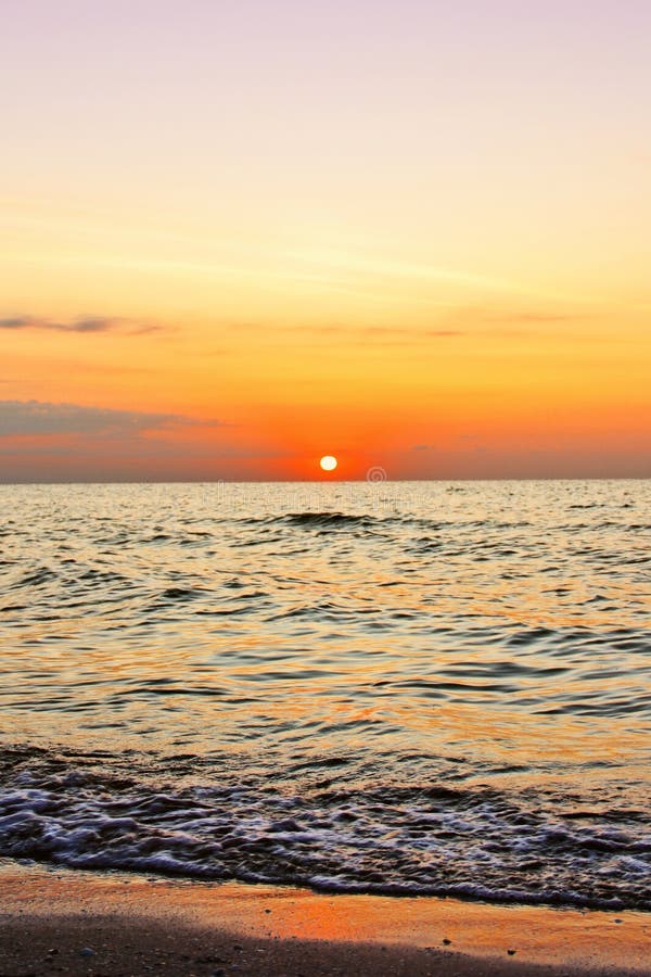 Beautiful Sunset at the Sea. the Sea in the Foreground Stock Photo ...
