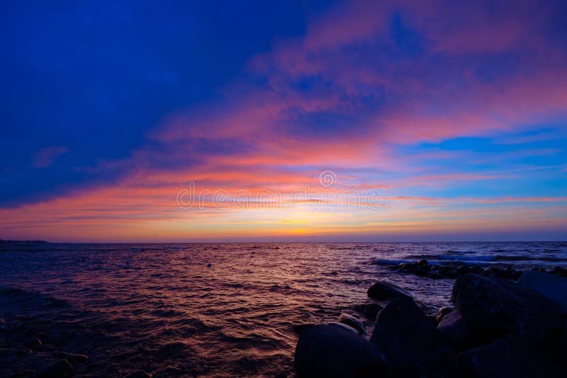 Beautiful Sunset at Sea Side with Stones Stock Image - Image of ...