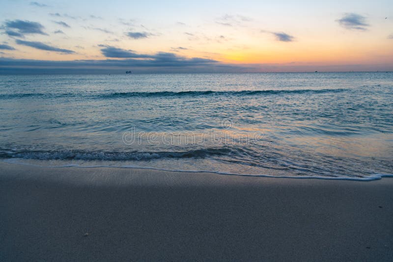 Beautiful Sunset with Sea Water on the Summer Beach Stock Image - Image ...