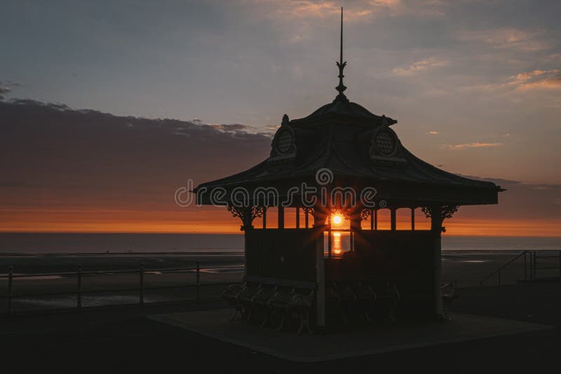 Beautiful Sunset Shining through a Structure on the Blackpool Shore ...