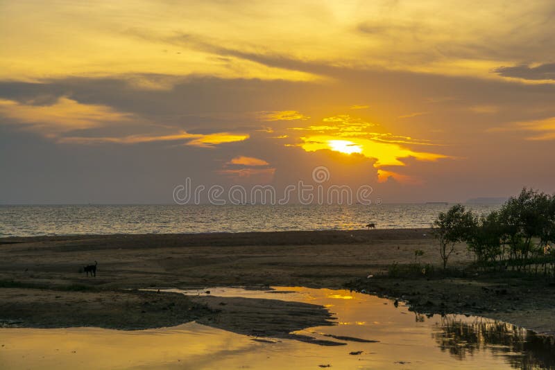 Beautiful Sunset Shot Cloudscape Over the Sea with Sun Rays. Selective ...