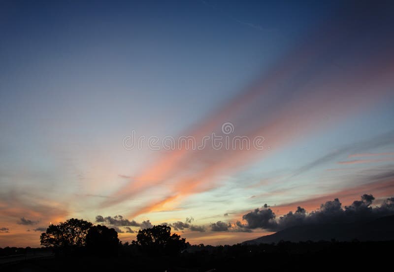 Sunrise with Silhouette of Trees and Gazebo with Sunray Stock Image ...