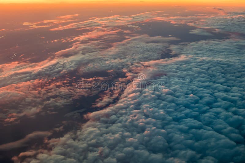 Dramatic Yellow and Orange Sunset Sky with Clouds and Sun Rays Stock ...