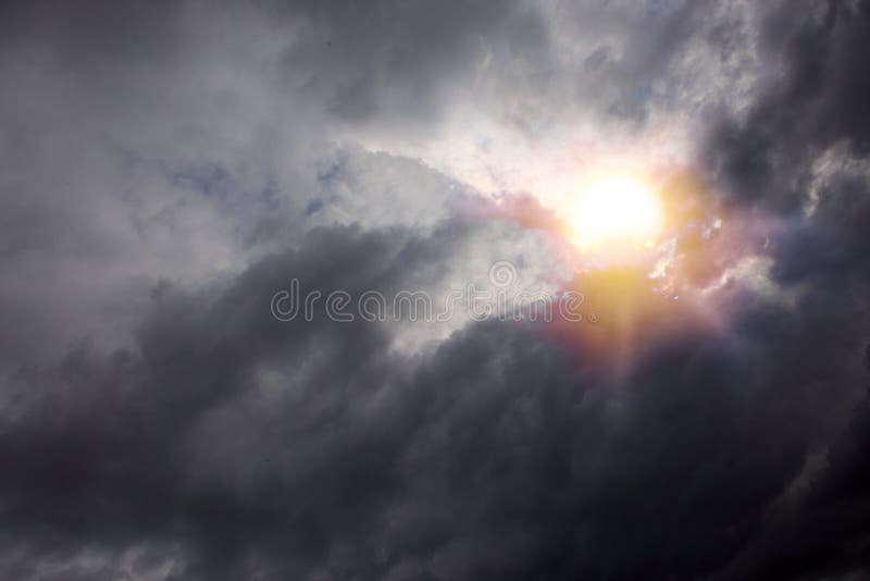 Sunset with Sun Rays and Sky with Gray Clouds. Stock Image - Image of ...