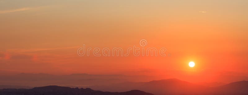 Beautiful Sunset on Sky Over Mountains Background. the Sun is on the ...