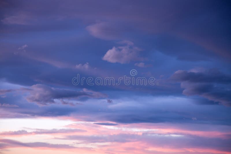 Beautiful Sunset Sky through the Sweeping Clouds Stock Photo - Image of ...