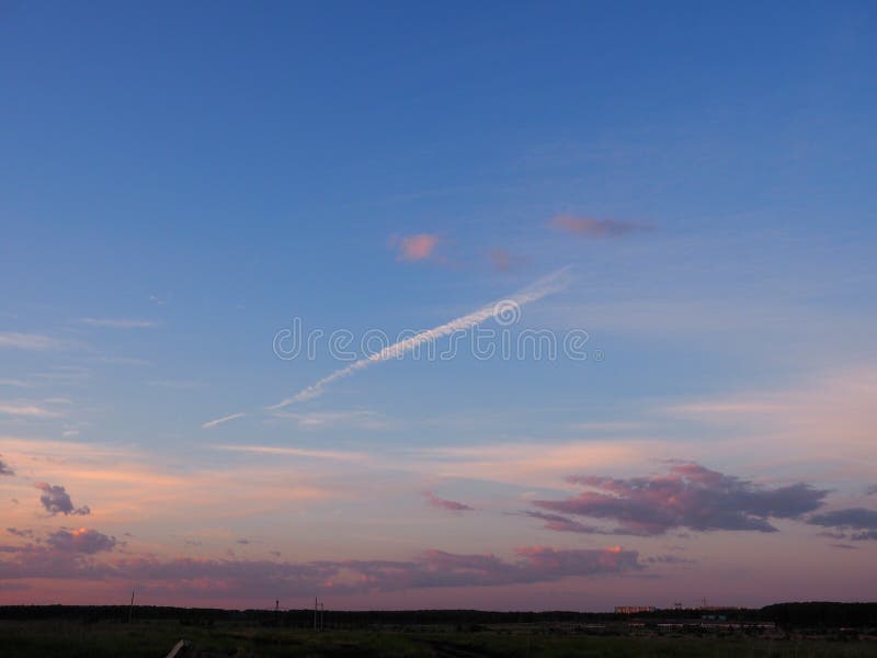 Beautiful Sunset Sky with Trace of a Plane Stock Image - Image of ...
