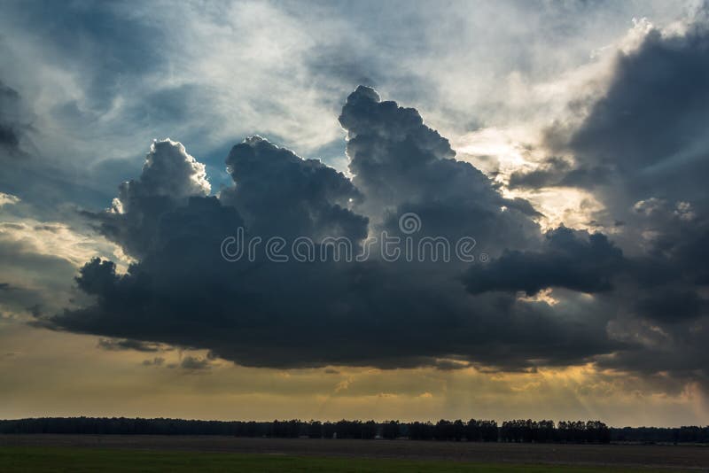 Beautiful Sunset with Sun Light from the Gray Clouds is Under the ...