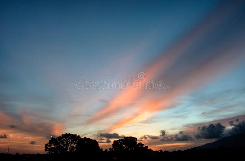Sunrise with Silhouette of Trees and Gazebo with Sunray Stock Image ...