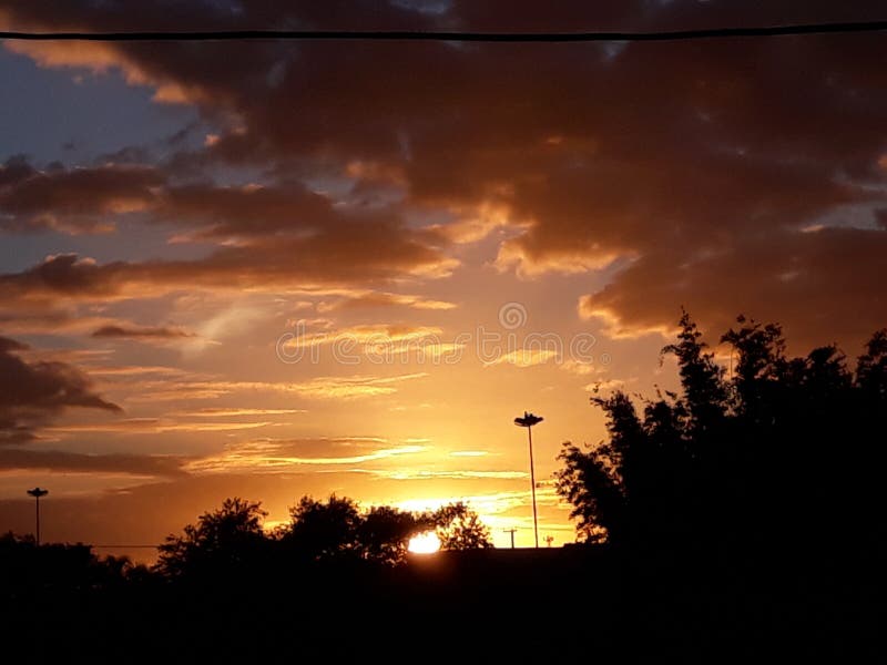 Beautiful sunset stock image. Image of houses, sunset - 143364185