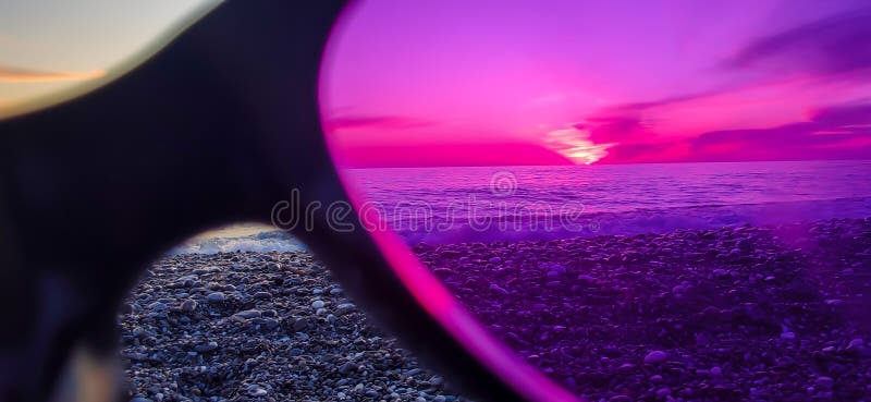 Beautiful Sunset through Sunglasses on the Beach. Sunglasses at Sunset ...