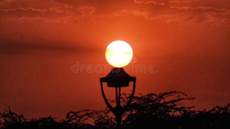 Beautiful Sunset on Top of a Light Pole Stock Image - Image of sunset ...