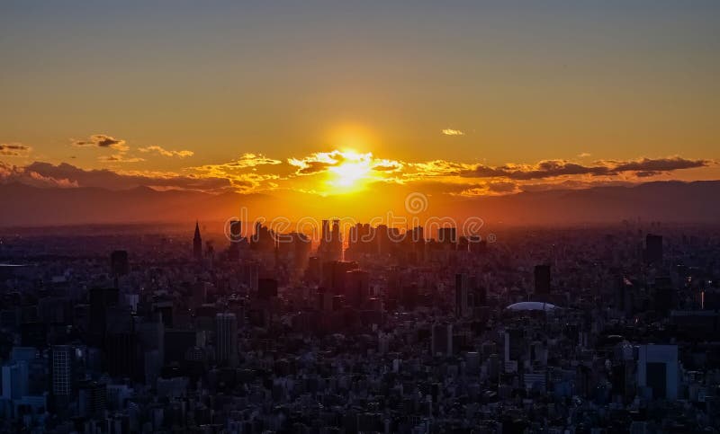 Beautiful Sunset View of a City Skyline, Illuminated by the Sun Stock ...