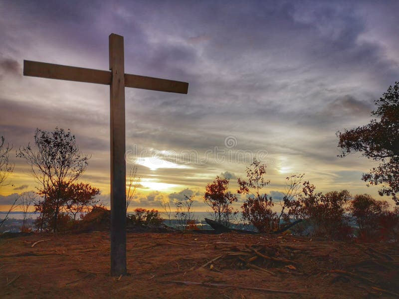 A Cross on the Top of the Hill before the Sunset Fall. Stock Photo ...