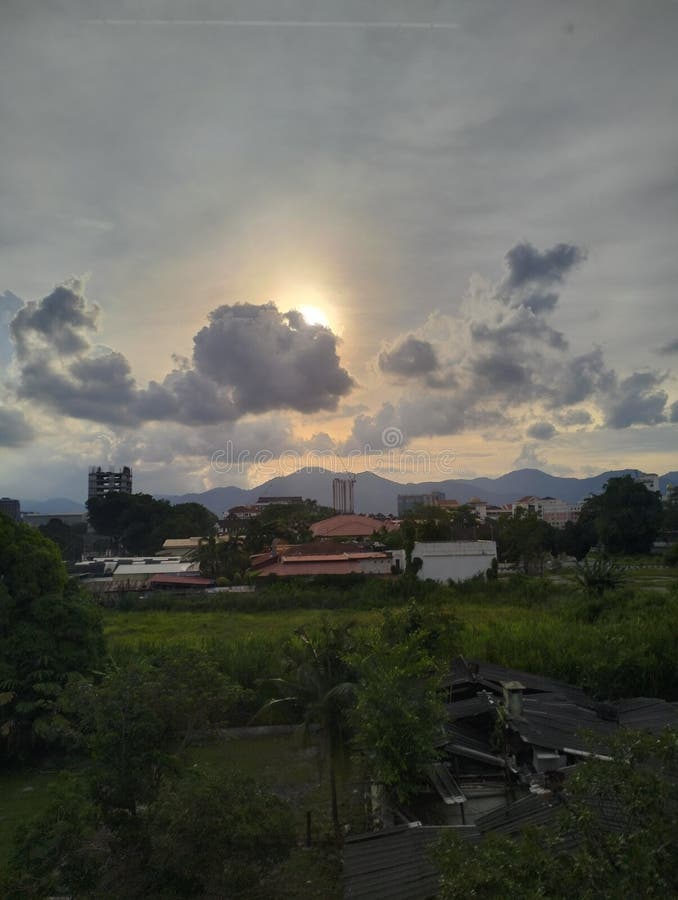 Beautiful Sunset View Hide Behind Cloud in Evening Stock Photo - Image ...
