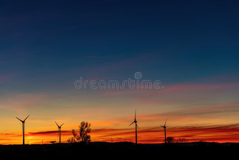 Beautiful Sunset with Wind Turbines on the Horizon Stock Photo - Image ...