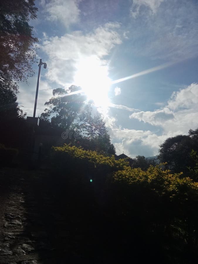 Beautiful Sunshine Passing through the Clouds and Trees Stock Image ...