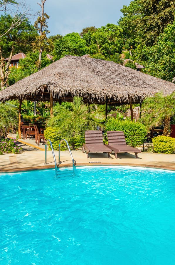 Beautiful Swimming Pool with Rattandeck Chairs Stock Image - Image of ...