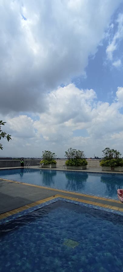 Beautiful Swimming Pool View and the Clouds Stock Image - Image of ...
