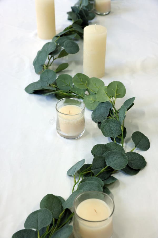 Beautiful Table Setting with Eucalyptus Branches and Candles Stock ...