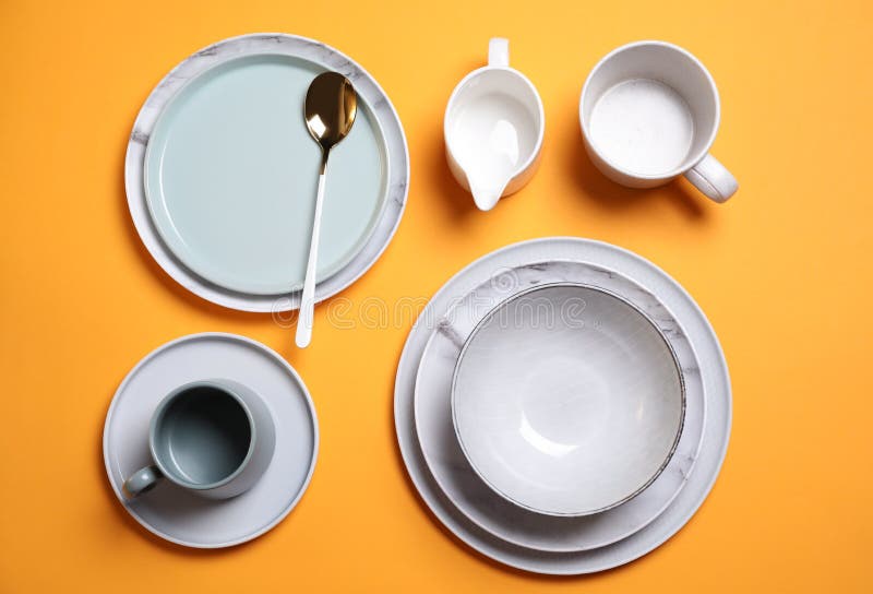 Beautiful Table Setting on Orange Background, Flat Lay Stock Image ...