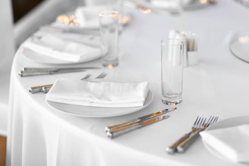 Beautiful Table Setting with White Tablecloth and Glass Glasses. Dining ...