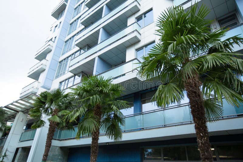 Beautiful Tall Hotel Buildings with Green Trees Stock Image - Image of ...