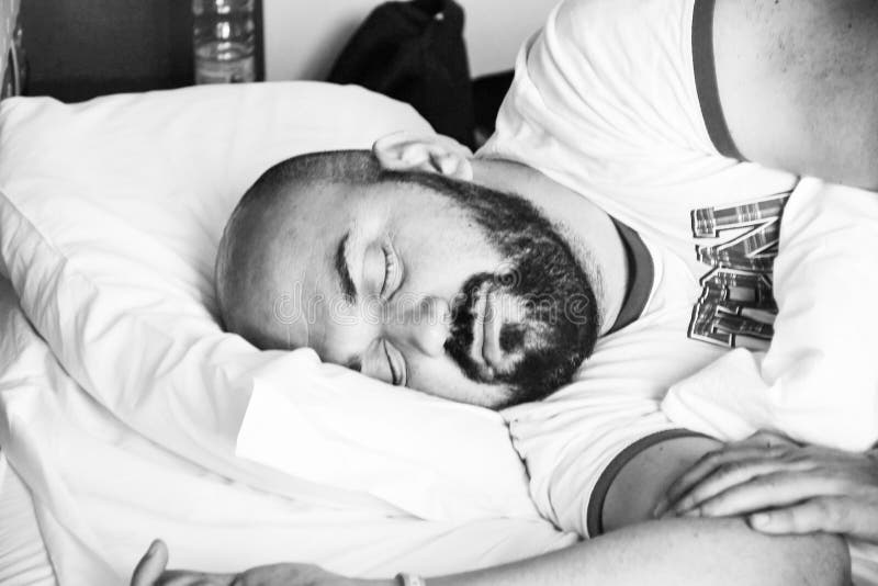 Sleeping man stock image. Image of muscular, laying - 120507899