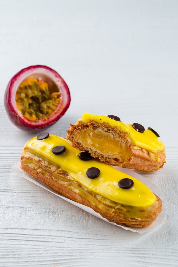 Beautiful and Tasty Eclair with Yellow Glaze and Mango-passion Fruit ...