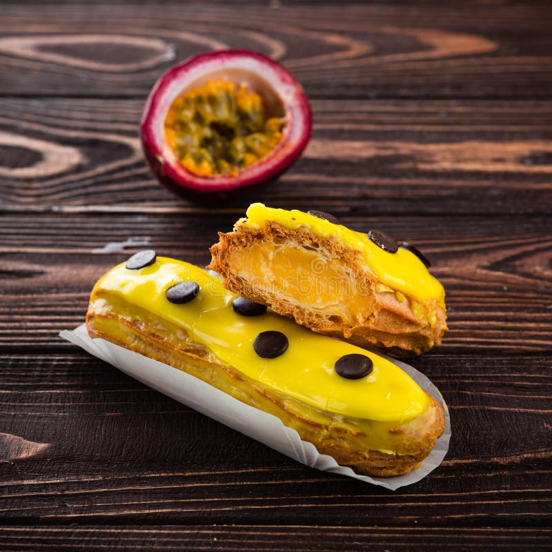 Beautiful and Tasty Eclair with Yellow Glaze and Mango-passion Fruit ...
