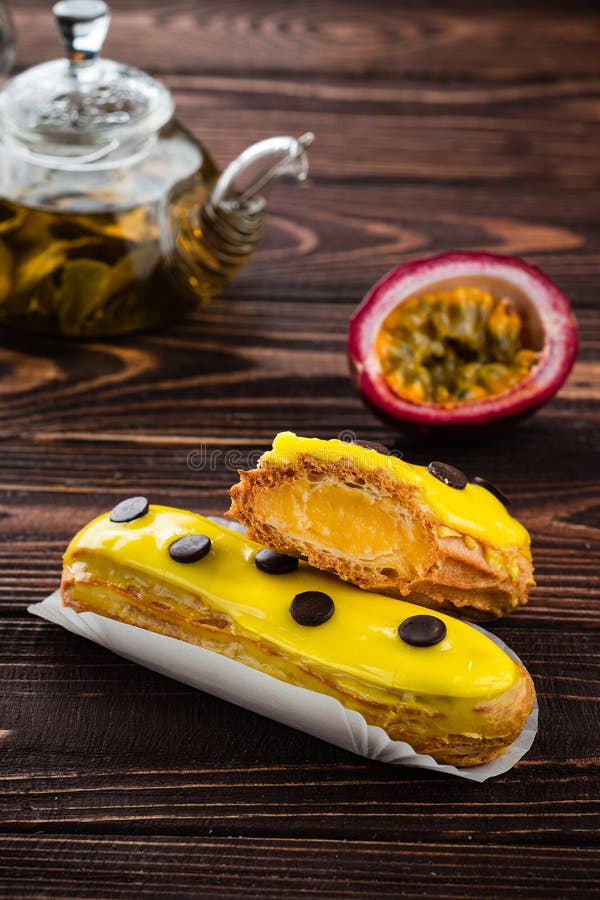 Beautiful and Tasty Eclair with Yellow Glaze and Mango-passion Fruit ...