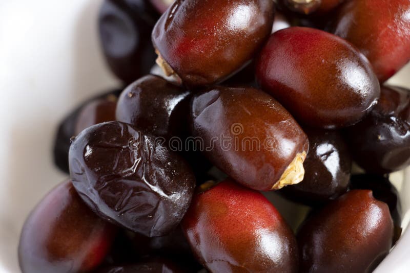 Dark Red Dates Fruit or Date Palm in White Background. Selective Focus ...