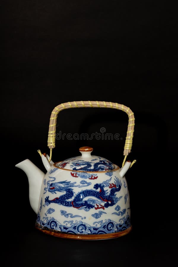 A Beautiful Tea Pot with Handle and Traditional Chinese Dragons Made on ...