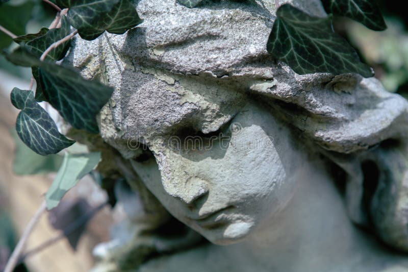 A Beautiful Tender Look of a Sad Angel Looking Down Stock Photo - Image ...