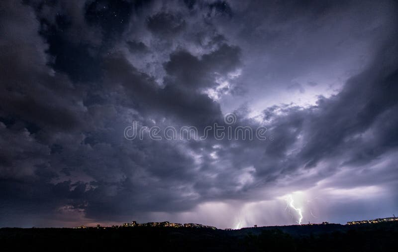 Beautiful Thunderstorm with Clouds and Lightning Over the Night City ...